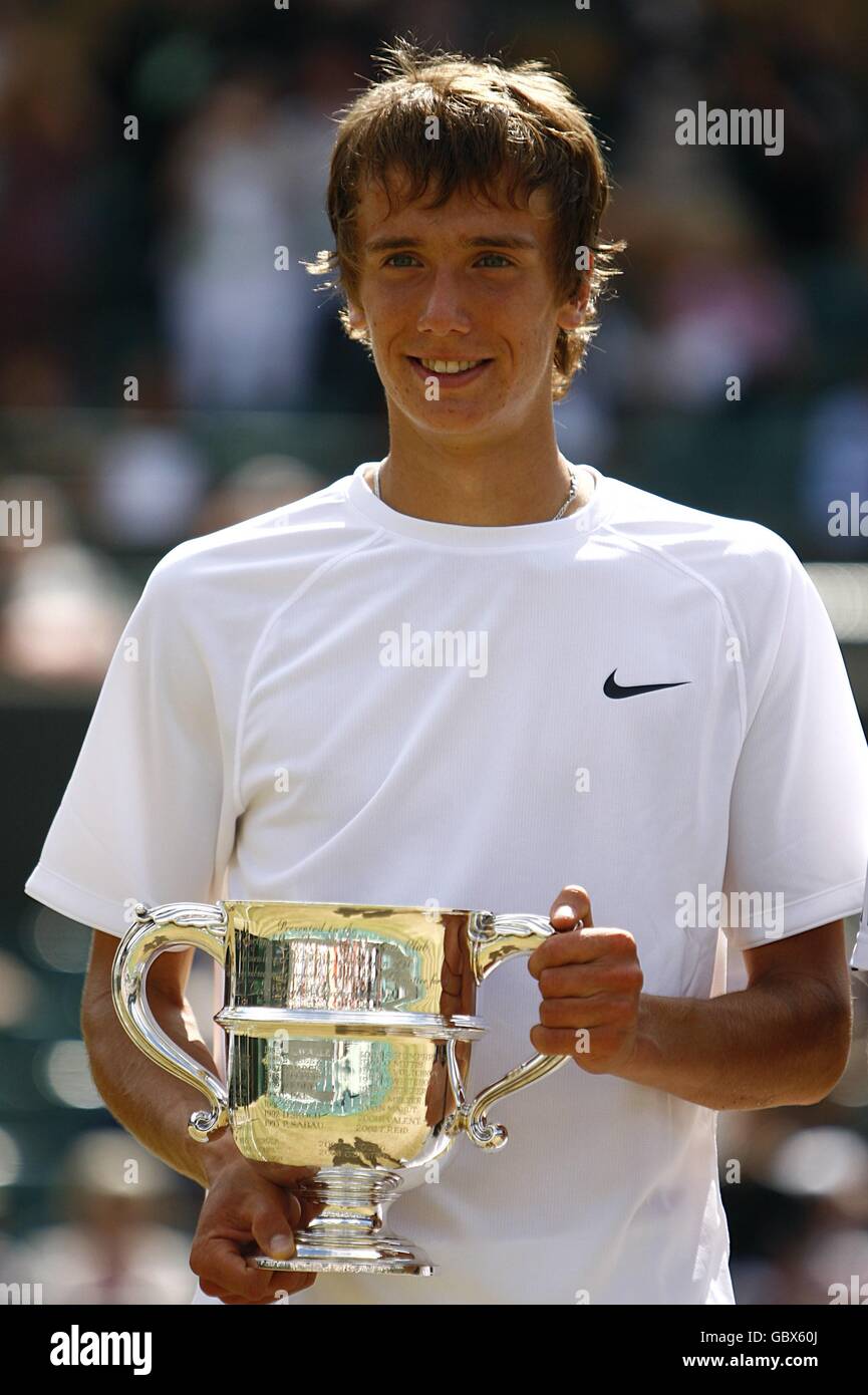 Russia's Andrey Kuznetsov celebrates with the trophy after beating USA ...