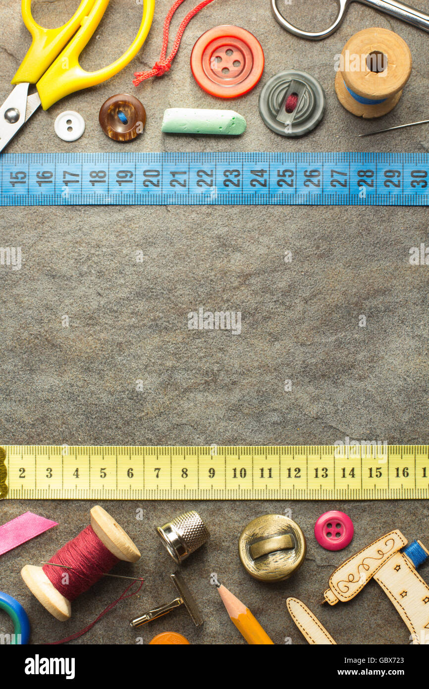 sewing tools and accessories on table background Stock Photo - Alamy