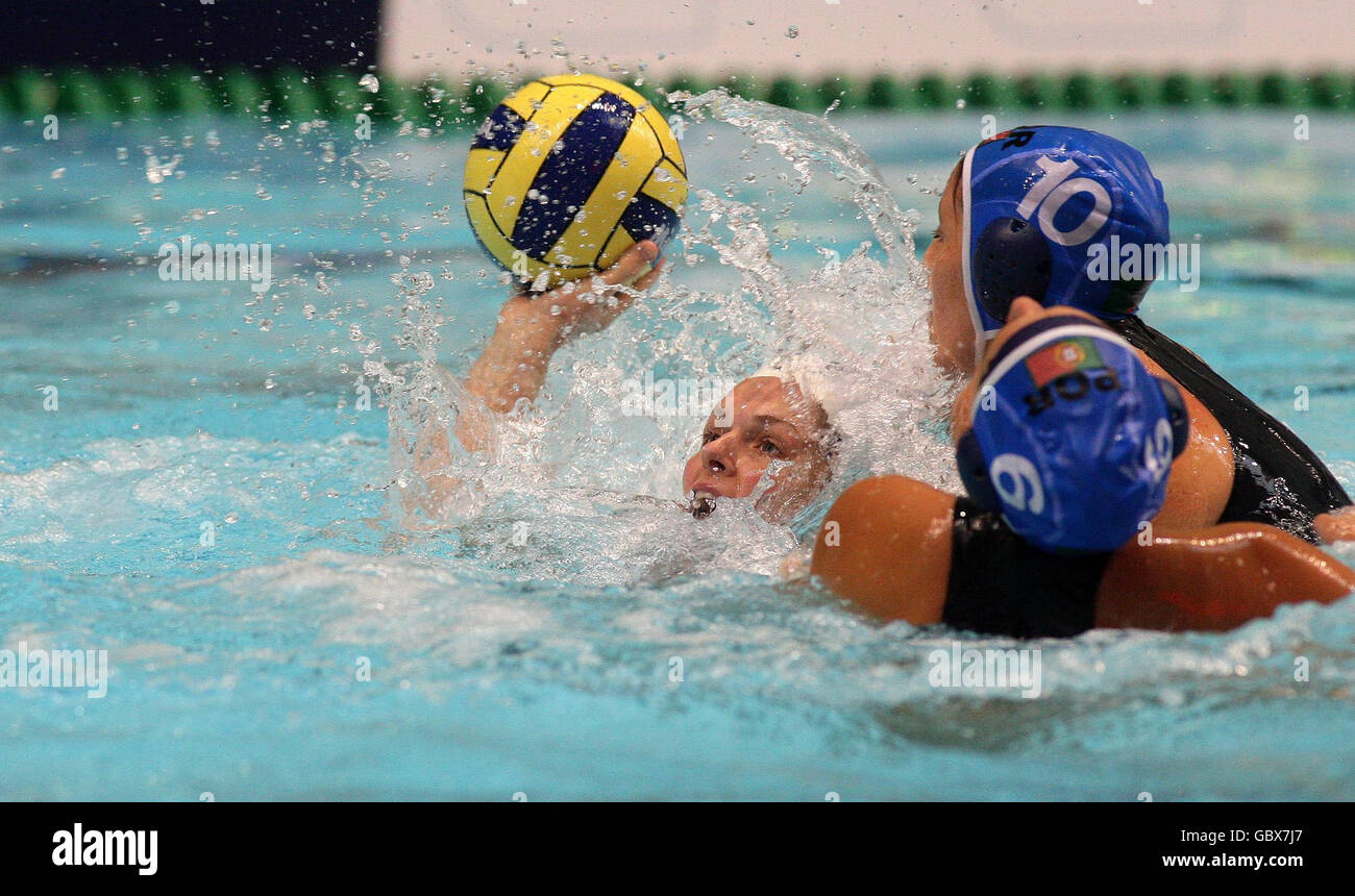 Great Britian's Frances Leighton shots under pressure from Portugal's ...