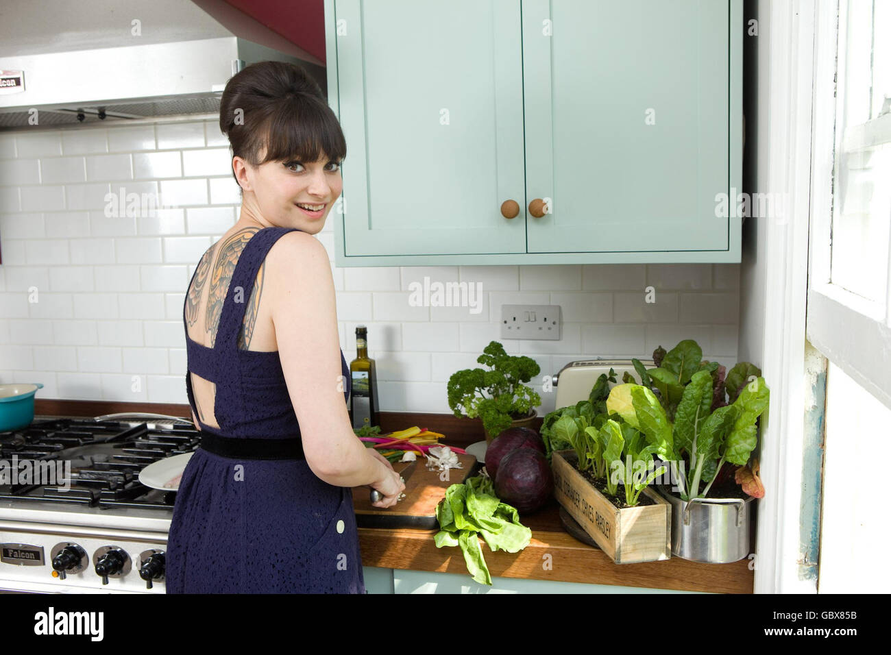 Chef and food writer Gizzi Erskine, at her home in east London for the ...