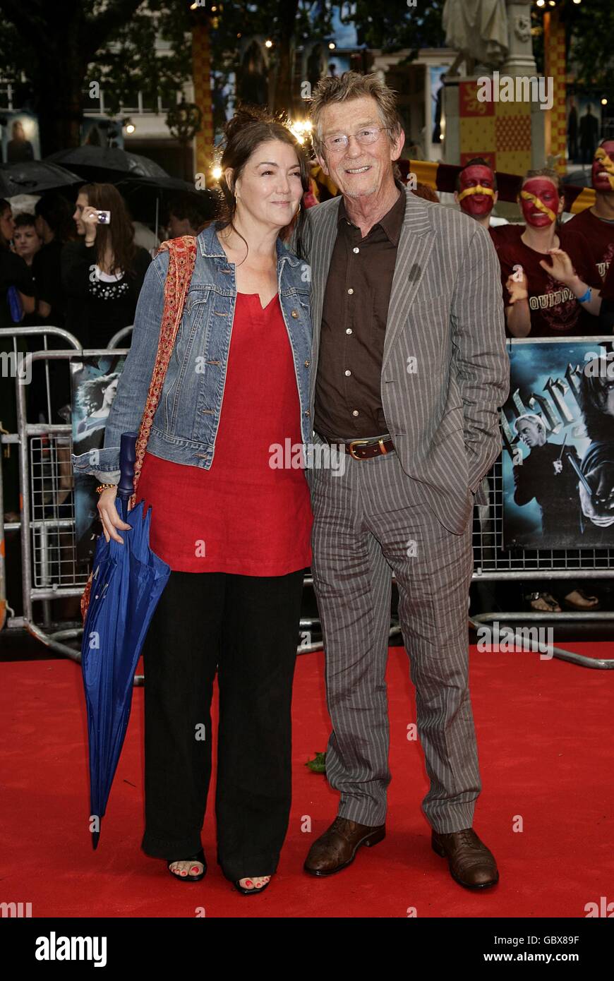 John Hurt and wife Ann Rees Meyers arriving for the world premiere of ...