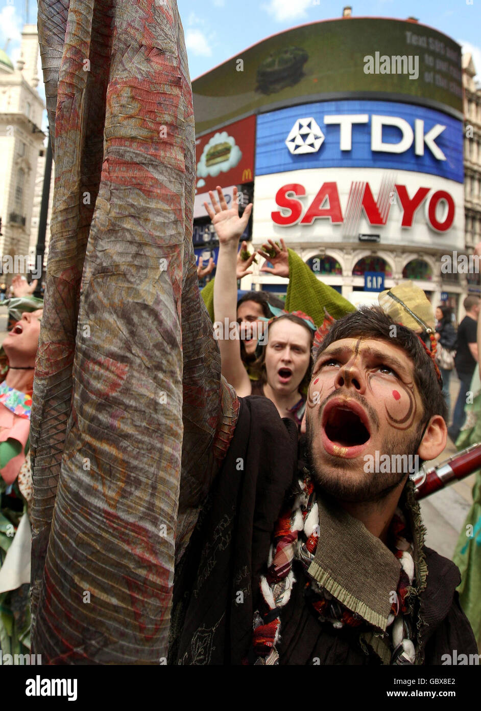 STANDALONE PHOTO Some of the 50 people dressed as trees performing in ...
