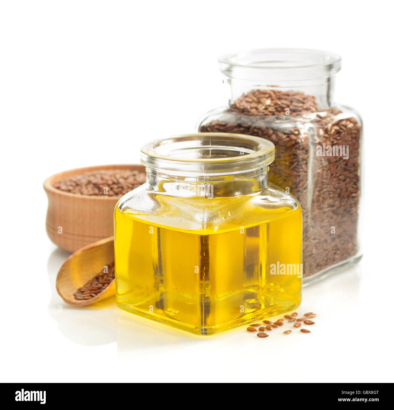 linseed oil in bottle isolated on white background Stock Photo - Alamy