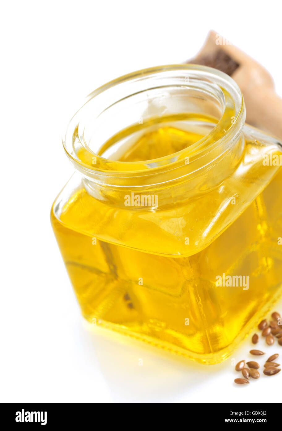 linseed oil in bottle isolated on white background Stock Photo - Alamy