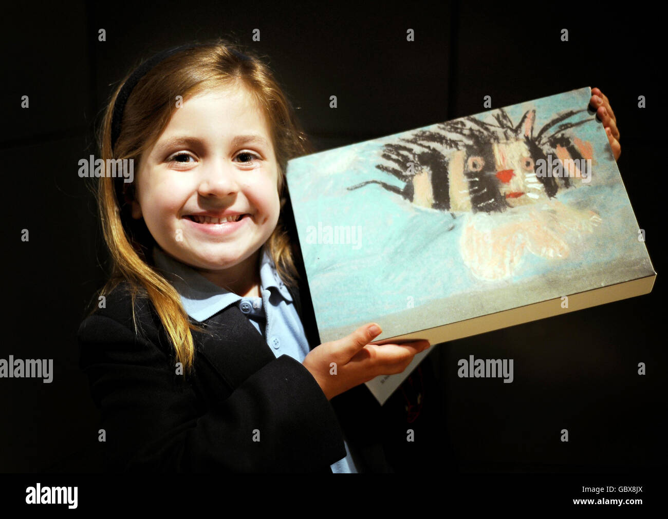 Tally Murray, five, poses with her winning artwork , as finalists in ...