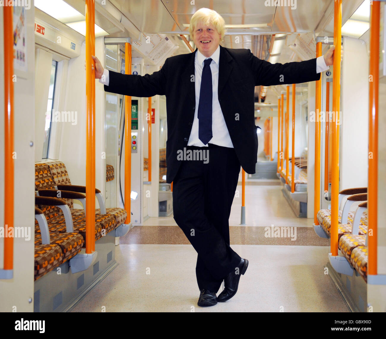 Mayor of London Boris Johnson stands in the 'worm design' carriage in ...