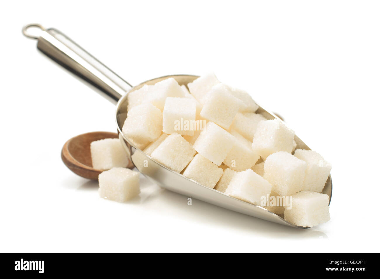 sugar cubes in scoop isolated on white background Stock Photo - Alamy