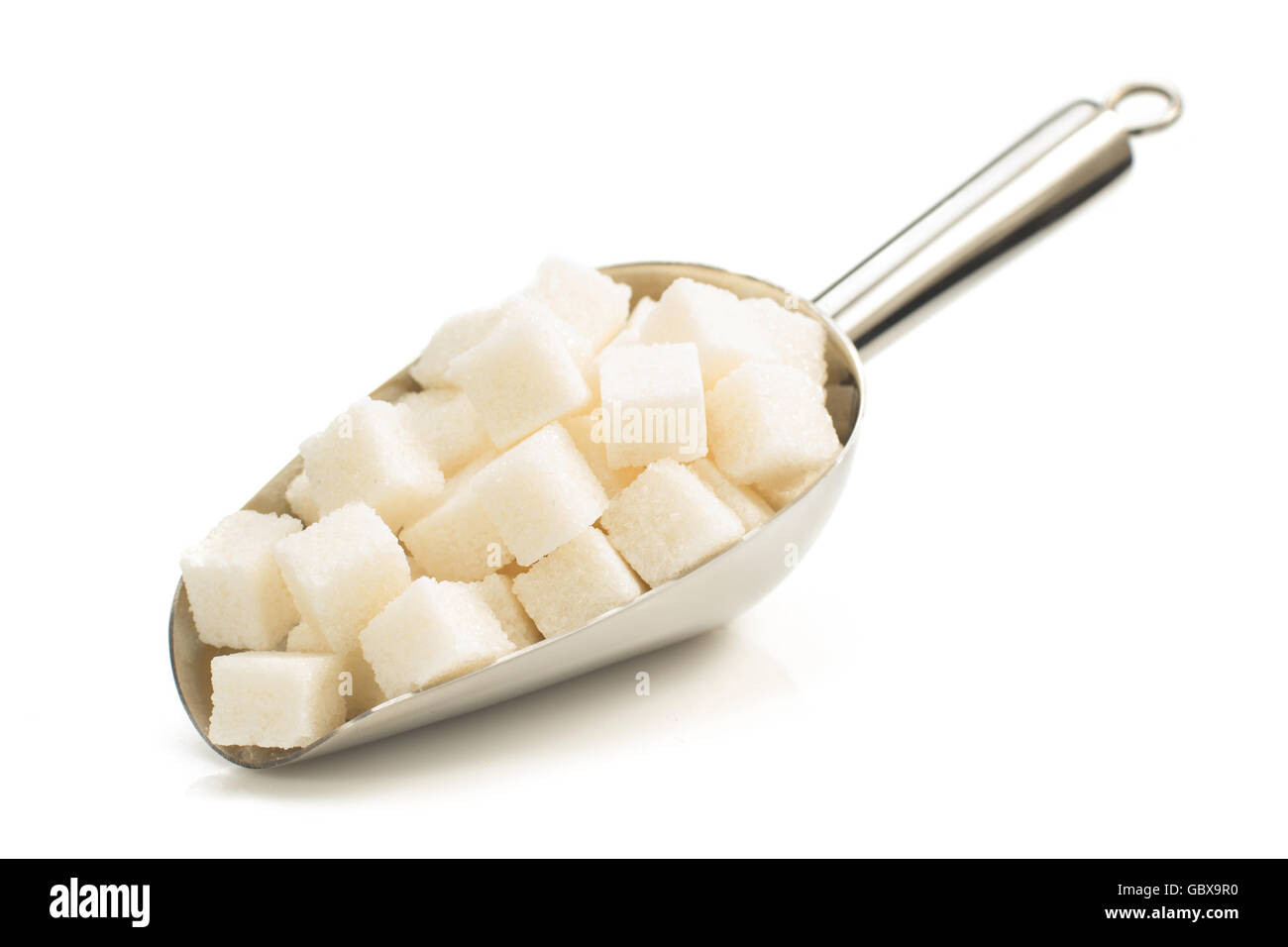 sugar cubes in scoop isolated on white background Stock Photo - Alamy