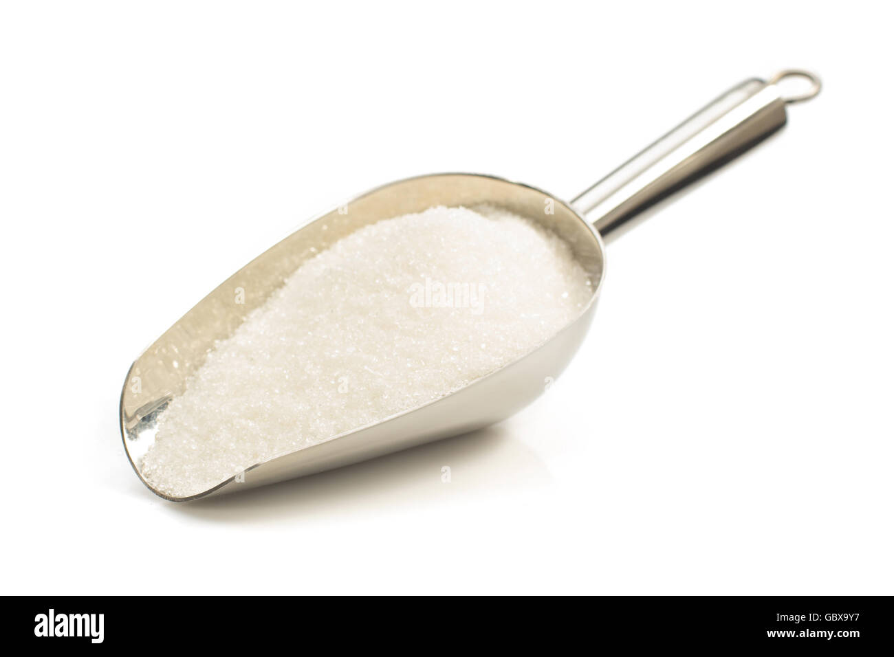 granulated sugar in scoop isolated on white background Stock Photo - Alamy