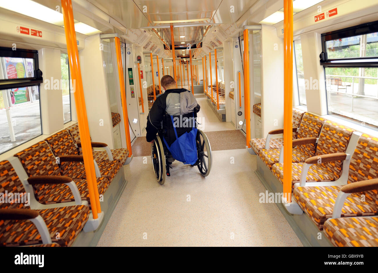 A disabled customer navigates their way through 'worm design' carriage ...