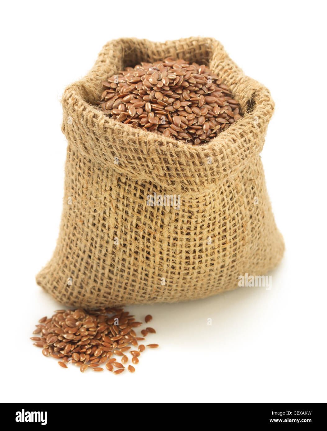 flax seeds in bag isolated on white background Stock Photo - Alamy