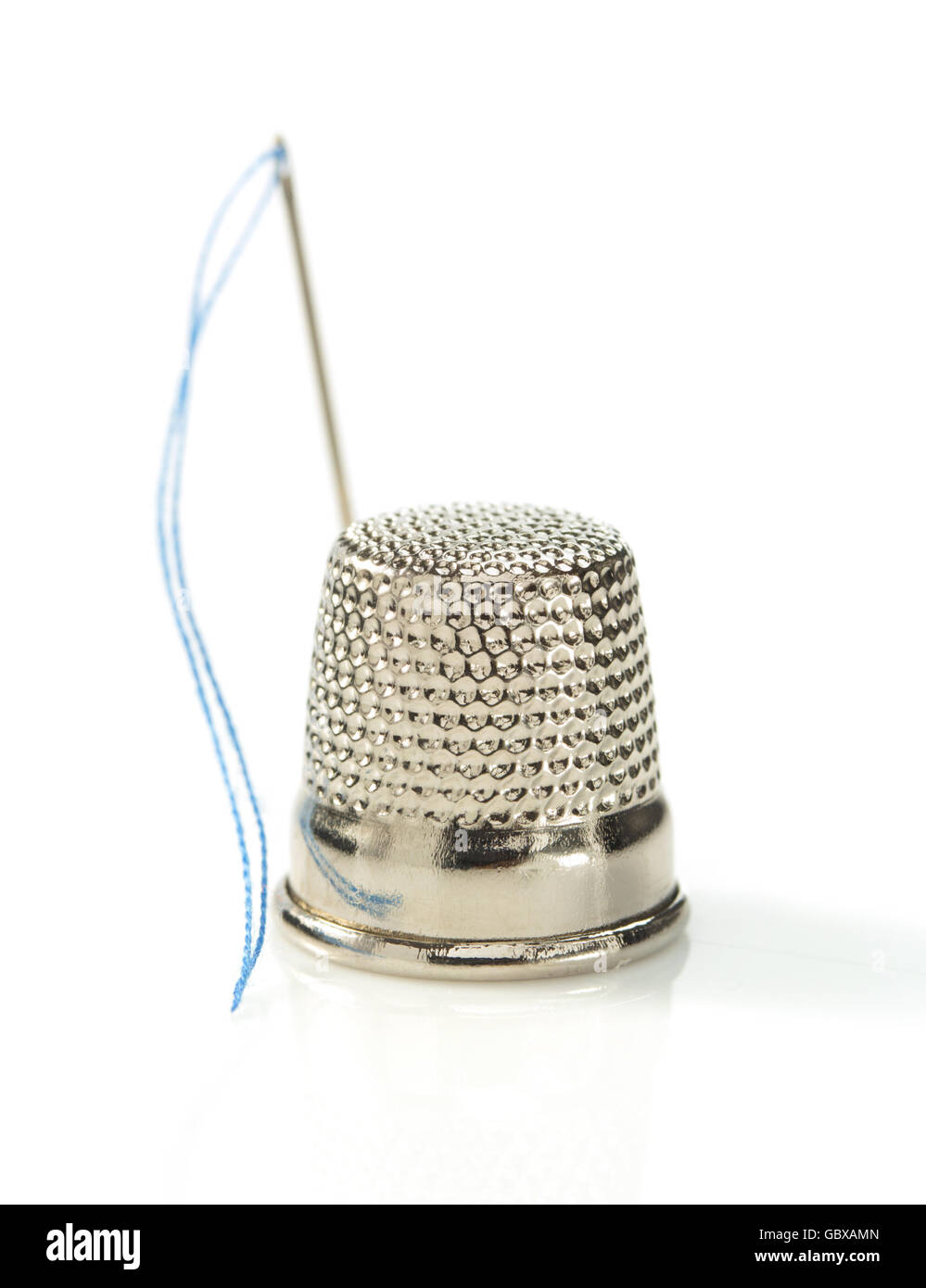 sewing thimble isolated on white background Stock Photo - Alamy