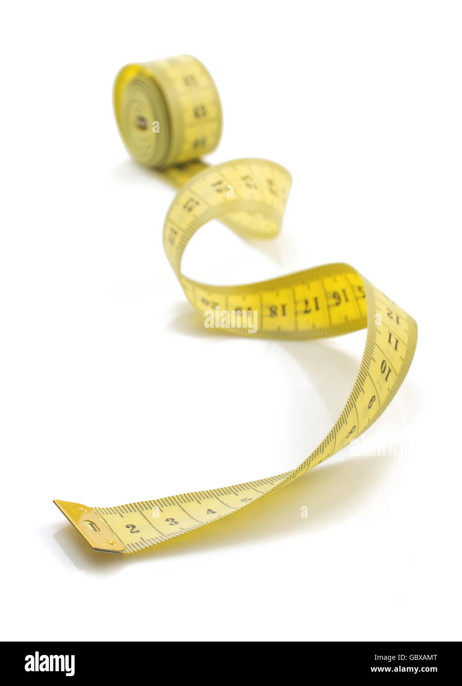 Twisted measuring tape Cut Out Stock Images & Pictures - Alamy