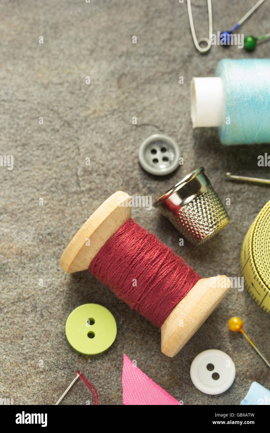 sewing tools and accessories on table background Stock Photo - Alamy