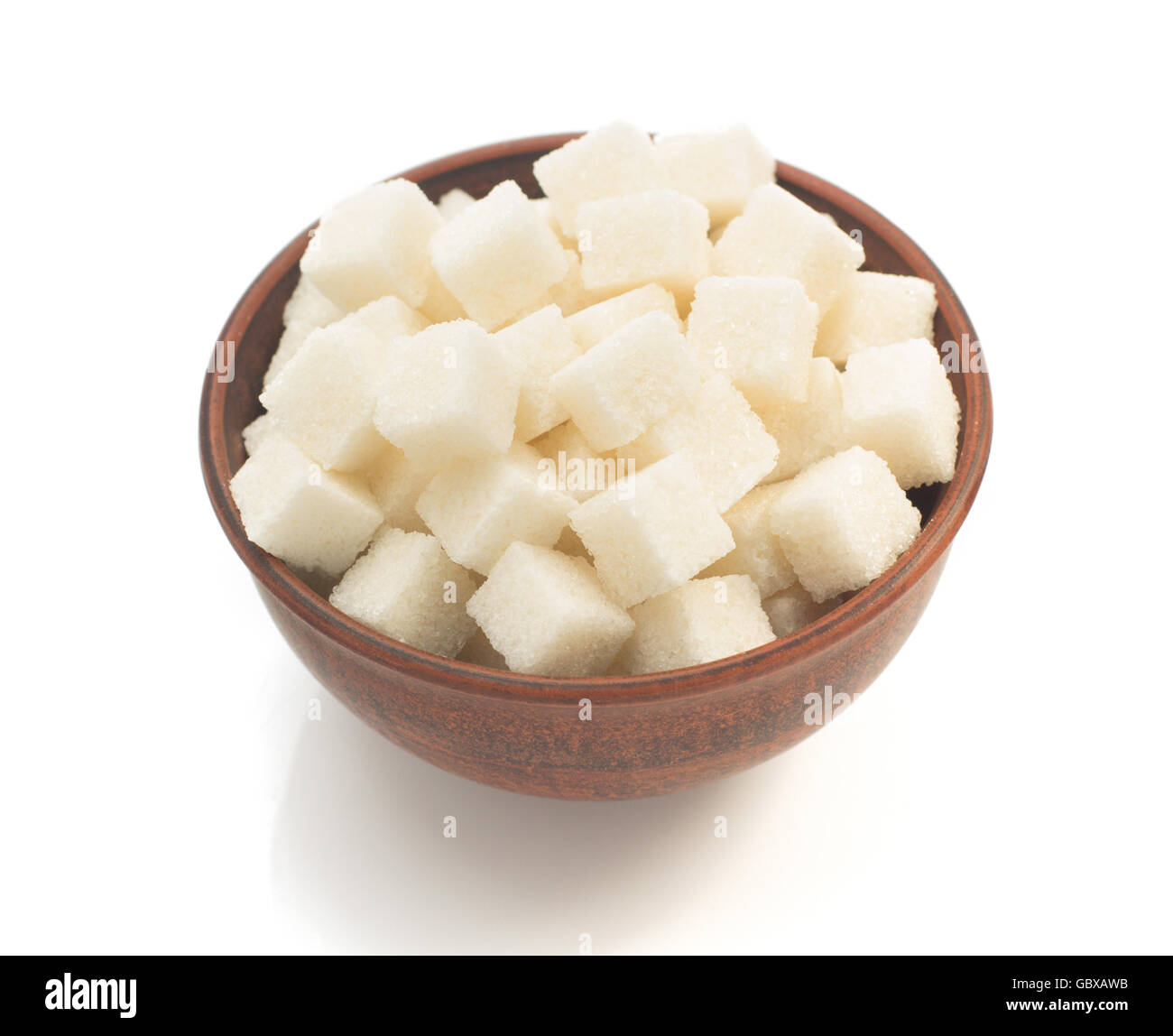 sugar cubes in bowl isolated on white background Stock Photo - Alamy