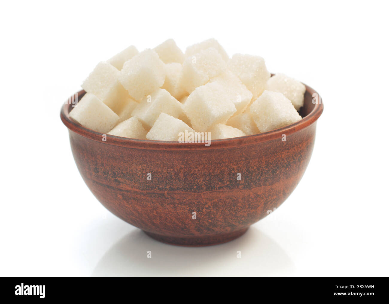 sugar cubes in bowl isolated on white background Stock Photo - Alamy