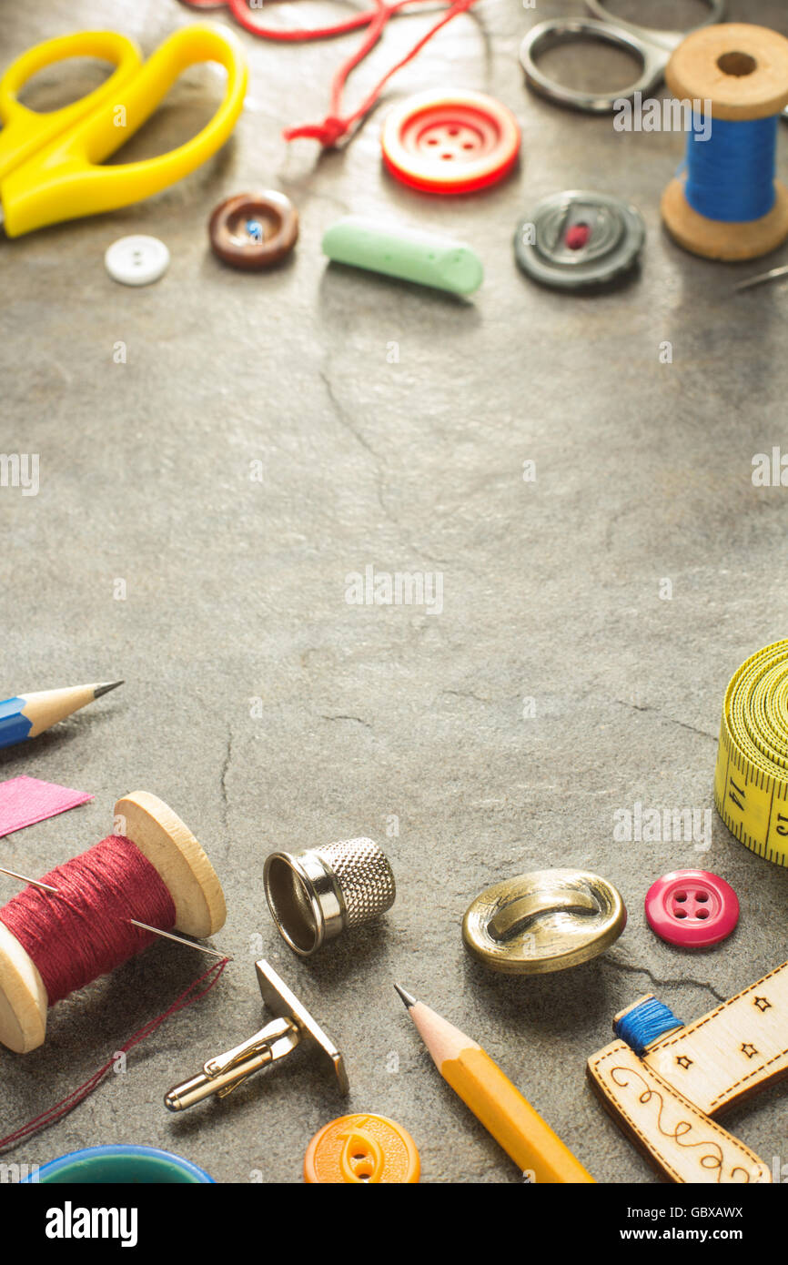 sewing tools and accessories on table background Stock Photo - Alamy