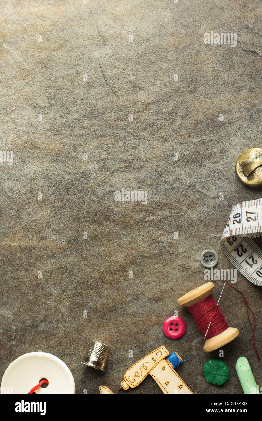 sewing tools and accessories on table background Stock Photo - Alamy