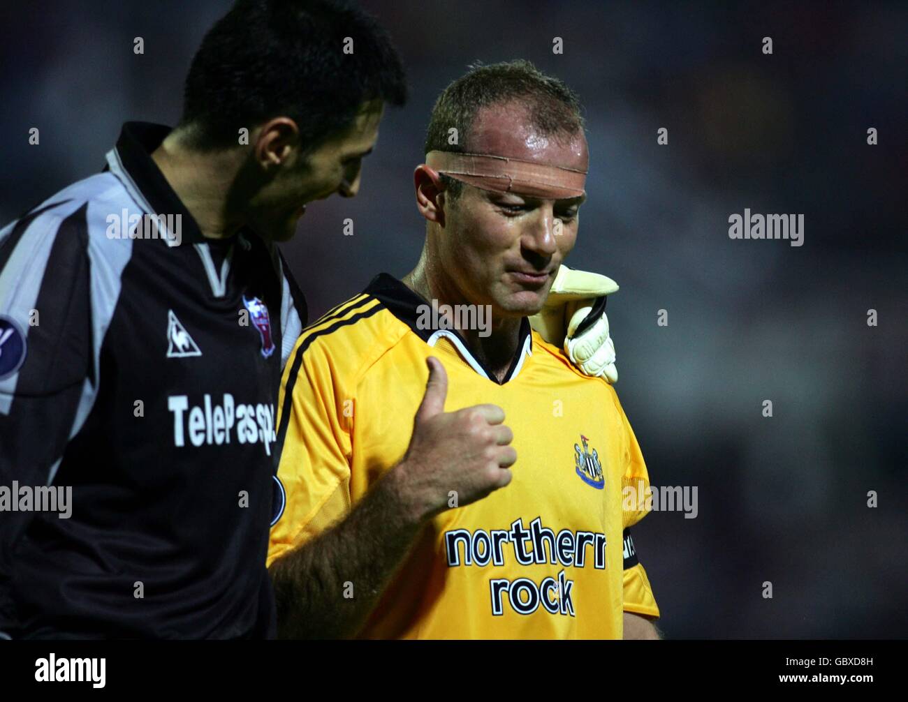 Newcastle United's Alan Shearer (r) gives a thumbs up to Panionios ...
