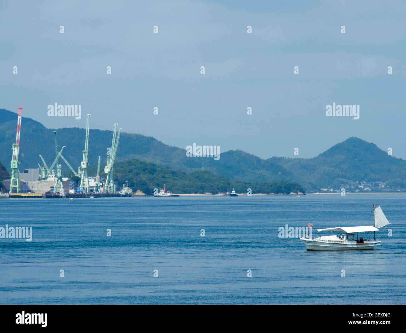A small traditional Japanese fishing boat in the Seto Inland Sea and ...