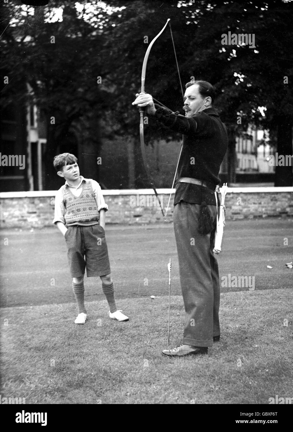 Under the watchful Black and White Stock Photos & Images - Alamy