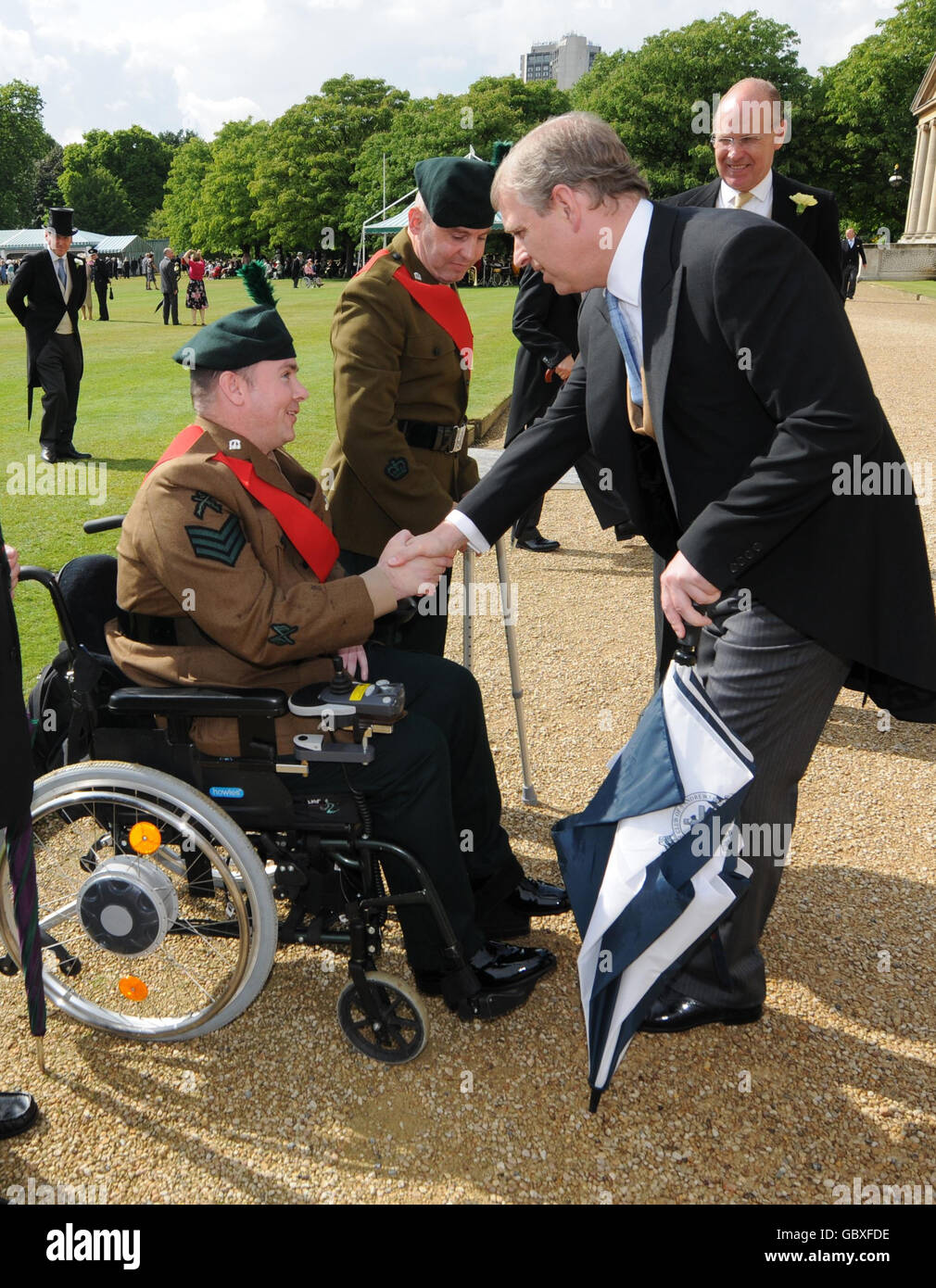 Sergeant Allie McKinney is greeted by Prince Andrew during the first ...
