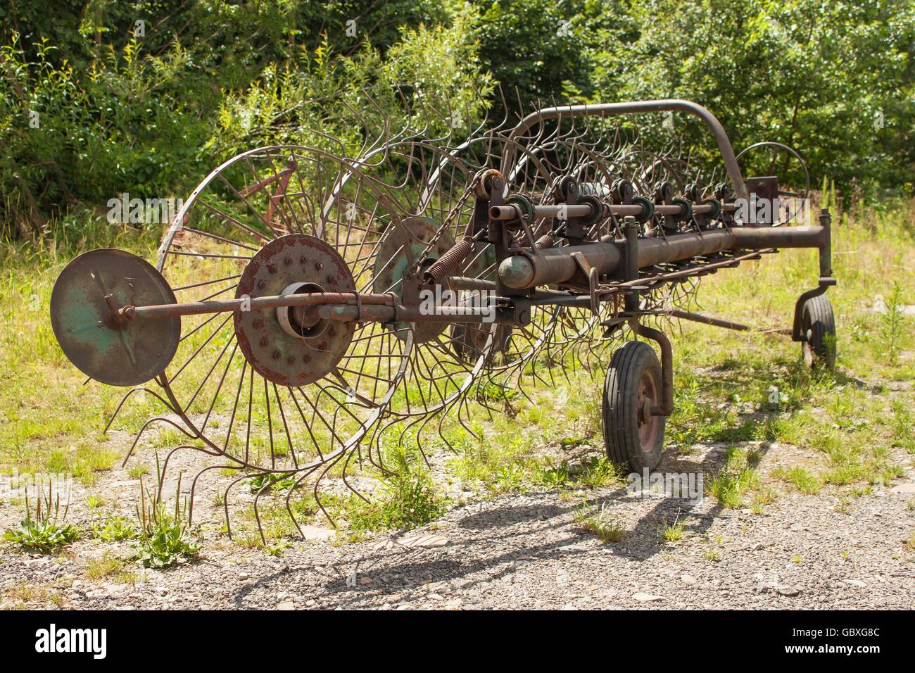 Turning hay with old tractor hi-res stock photography and images - Alamy
