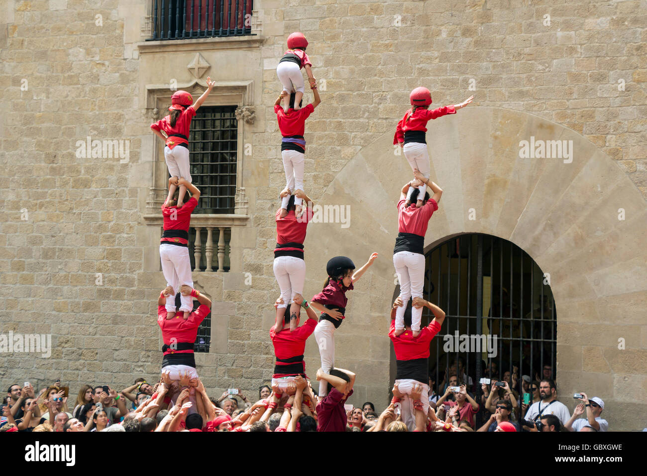BARCELONA, SPAIN - JUNE 26, 2016: Castellers group of people that build ...