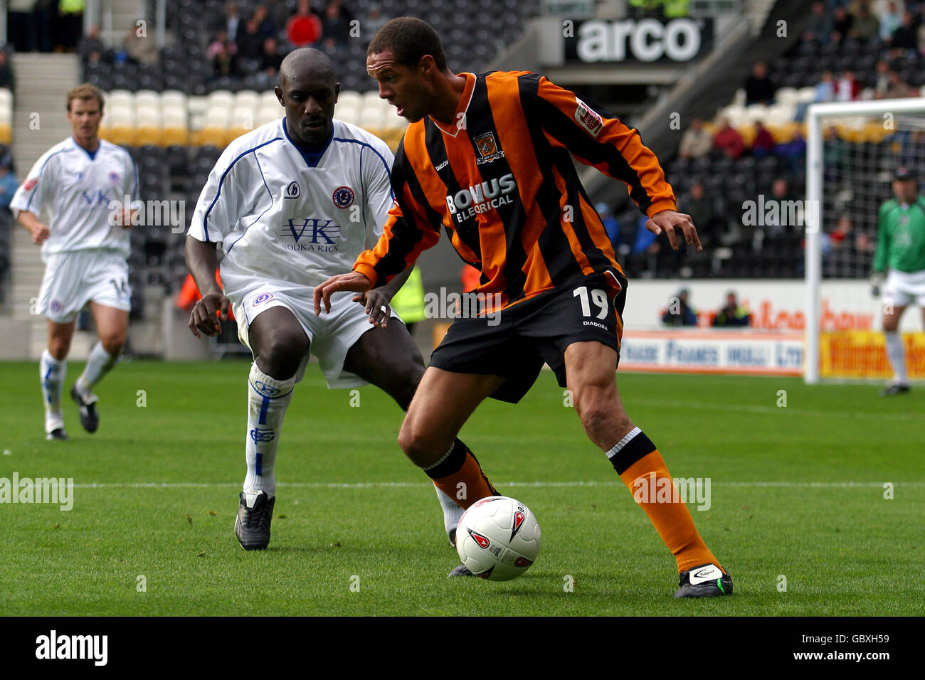 Hull City's Junior Lewis (r) gets away from Chesterfield's Wayne ...