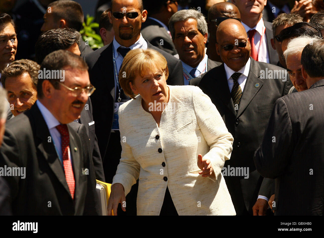Chancellor of Germany Angela Merkel makes her way to the stage where ...