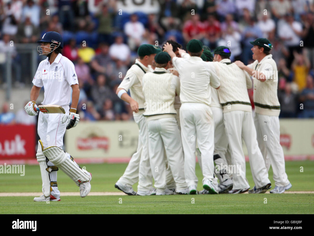 England's Alastair Cook shows his dejection after losing his wicket to ...