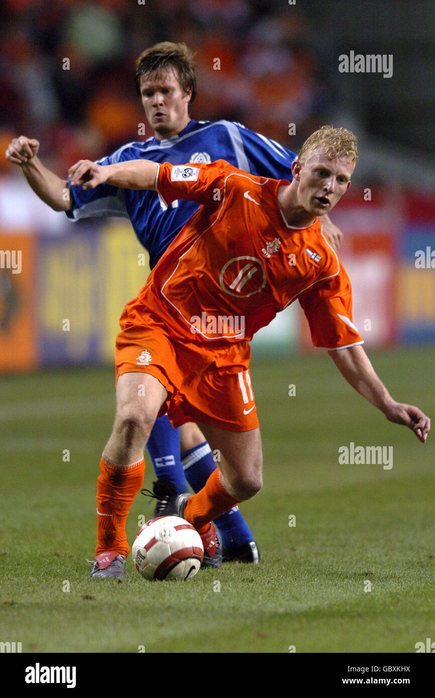 Hollands dirk kuyt front shields the ball from finlands kolkka hi-res ...