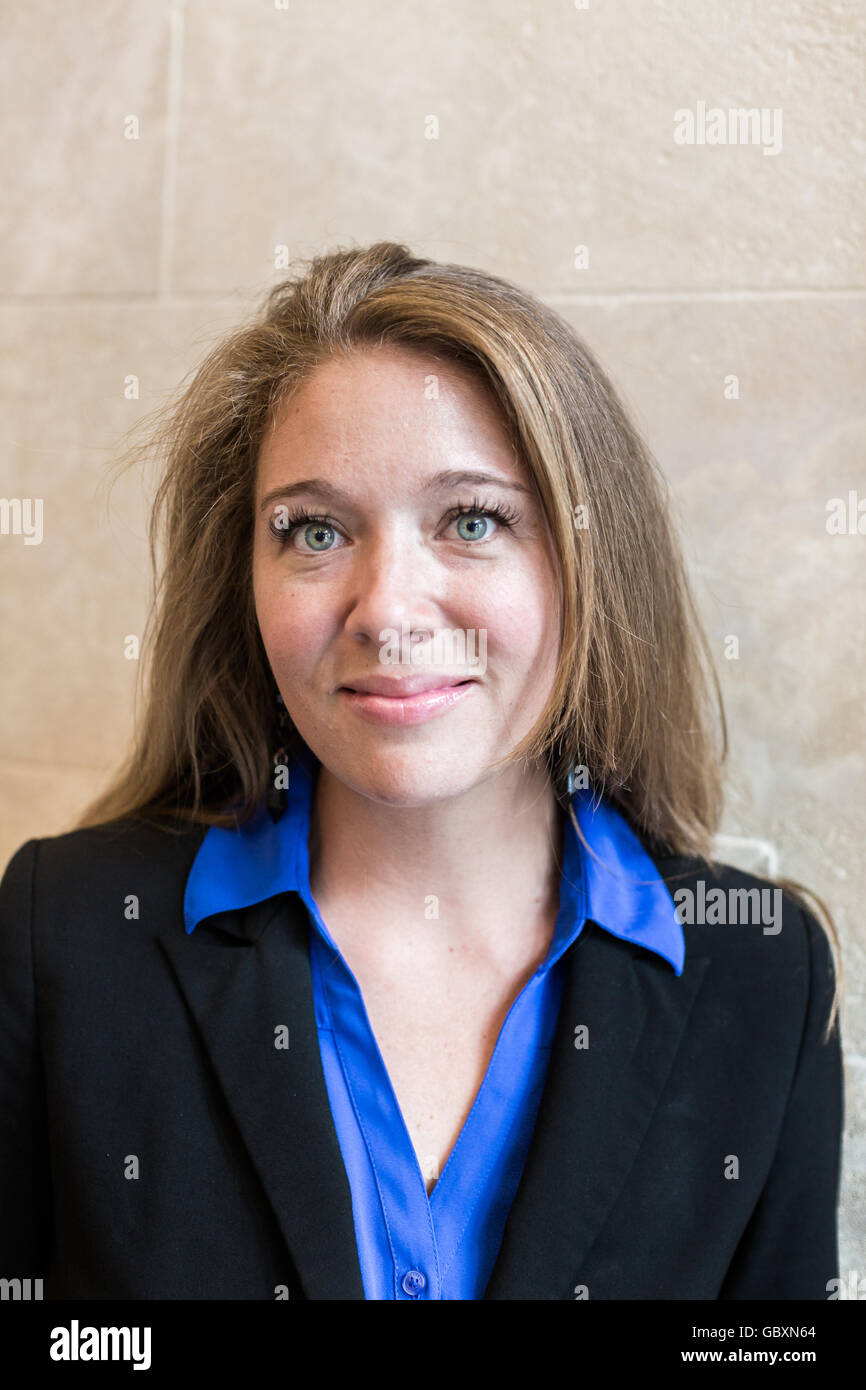 Portrait of business woman in blue shirt Stock Photo - Alamy