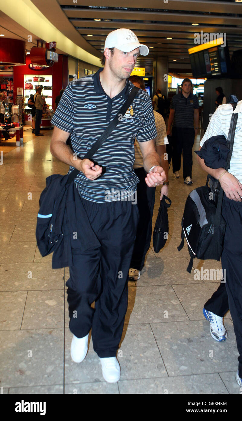 Manchester City's Stuart Taylor walks through Terminal 5 at Heathrow ...