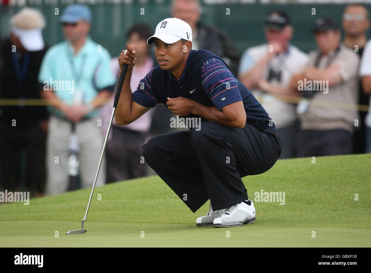 Golf open golf open green putter cap baseball study crouch hi-res stock ...