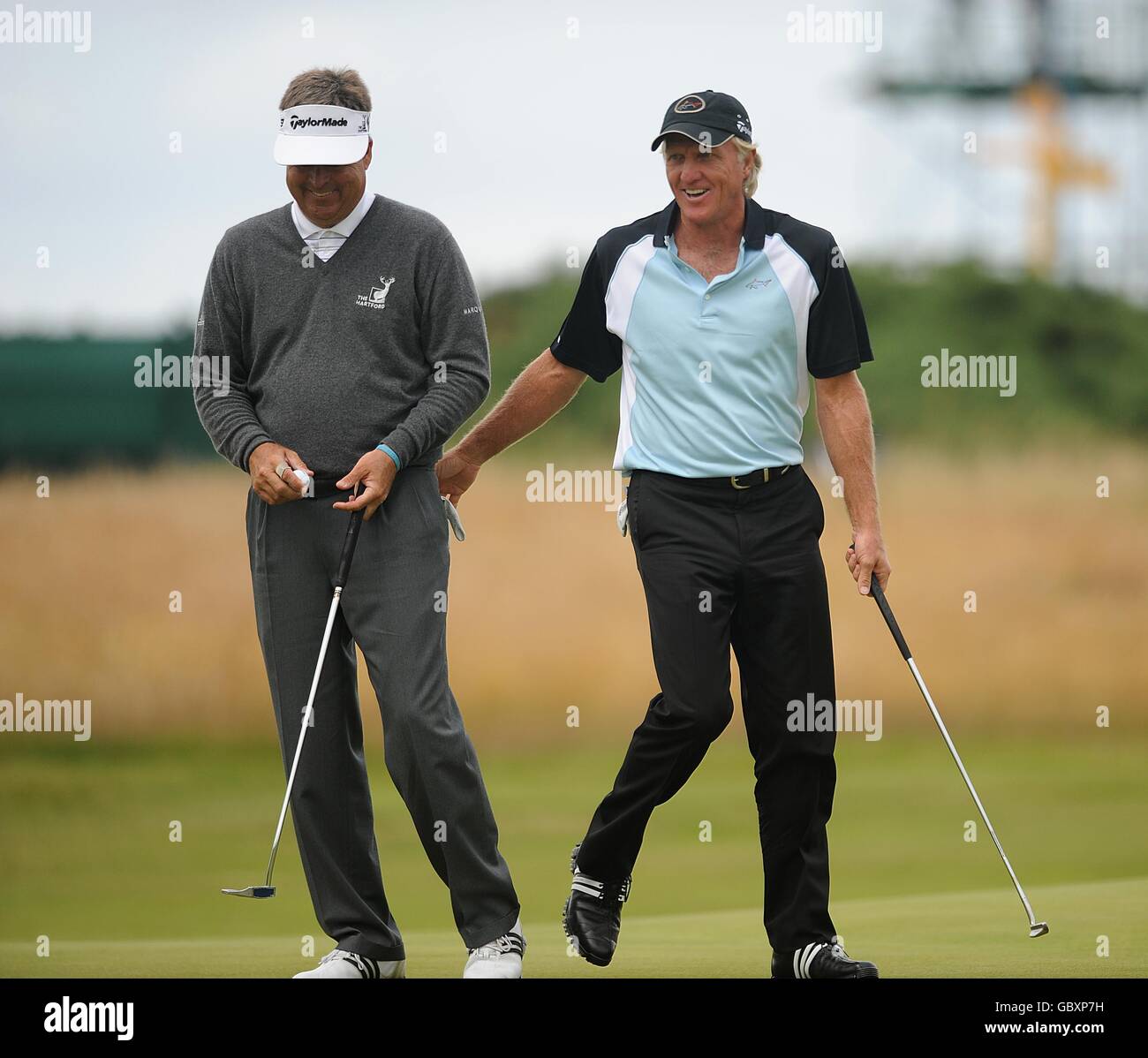 Australia's Greg Norman and USA's Kenny Perry share a joke during the ...
