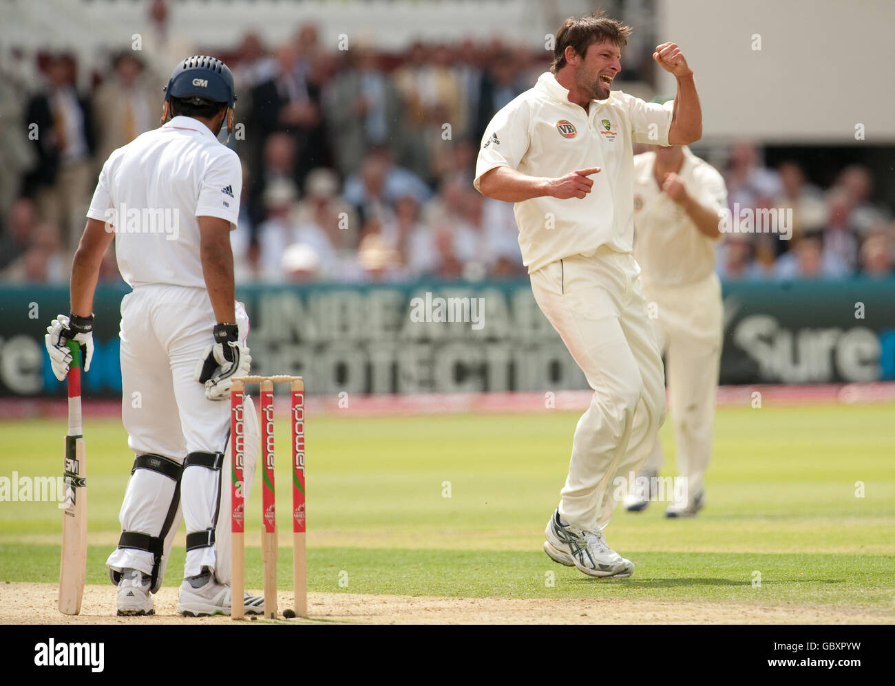 Australia's Ben Hilfenhaus celebrates dismissing England's Ravi Bopara ...