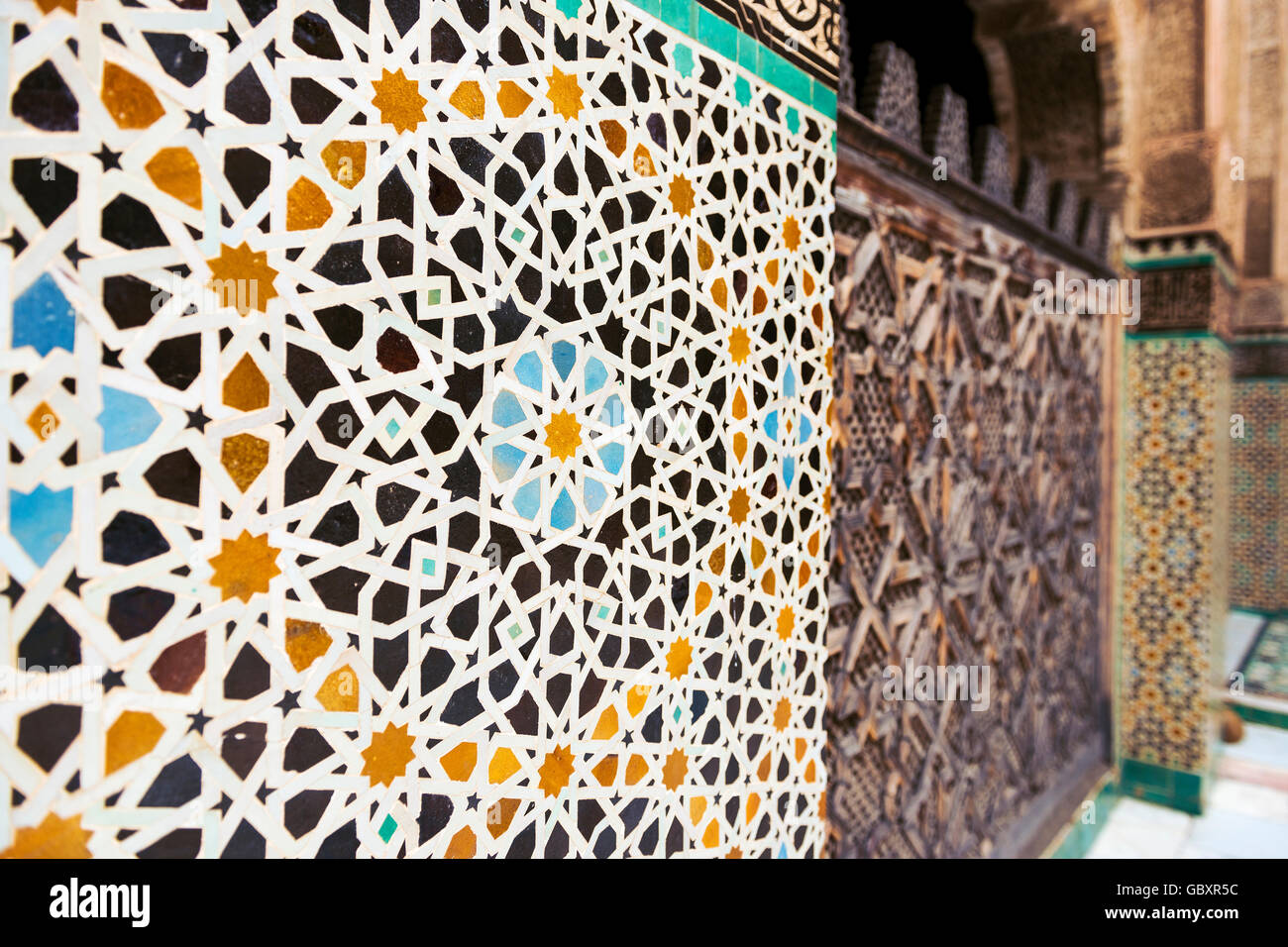 Fez madrasa wall tiles hi-res stock photography and images - Alamy