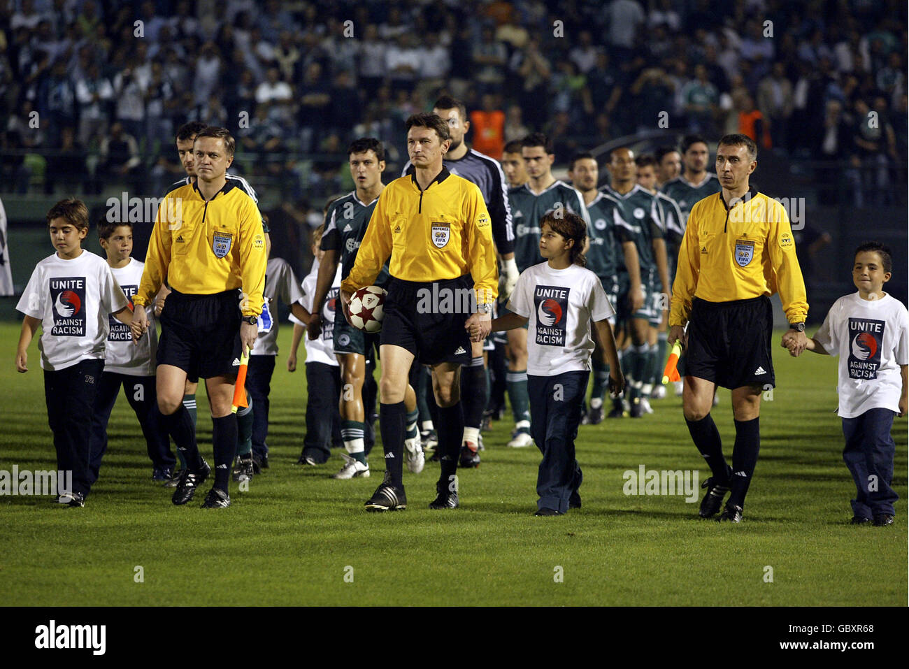 Referee Valentin Ivanov (c) and his assistants Evgueni Volnin and ...