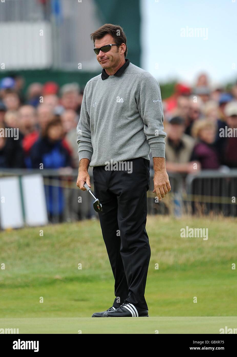 England's Sir Nick Faldo looks dejected after missing his putt on the ...