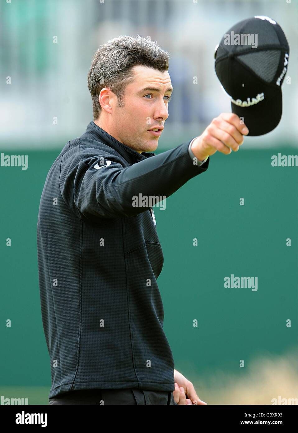 England's Ross Fisher acknowledges the crowd after his round during the ...