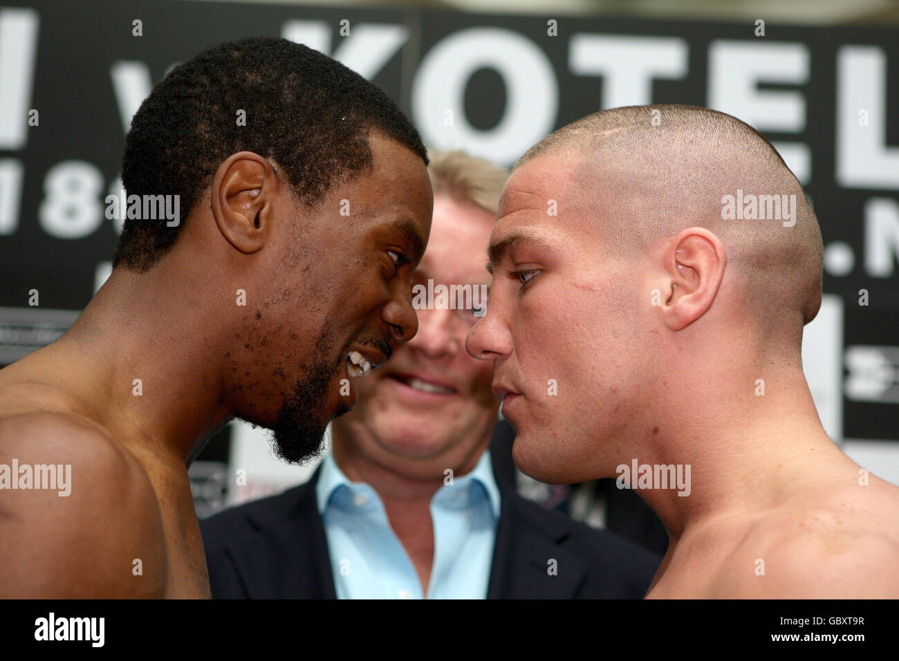 Anthony Small (left) and Matthew Hall square up during the weigh in at ...