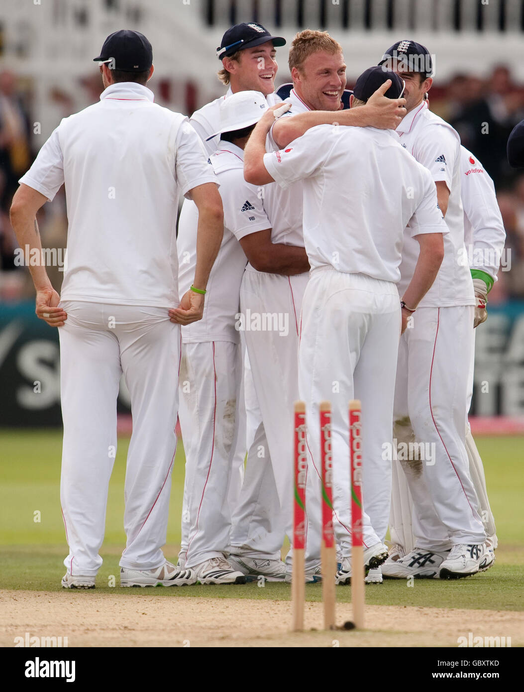 England's Andrew Flintoff (centre) celebrates dismissing Australia's ...