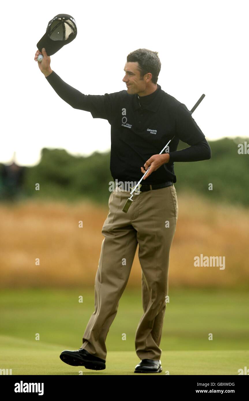 England's Ross Fisher acknowledges the crowd after finishing his round ...
