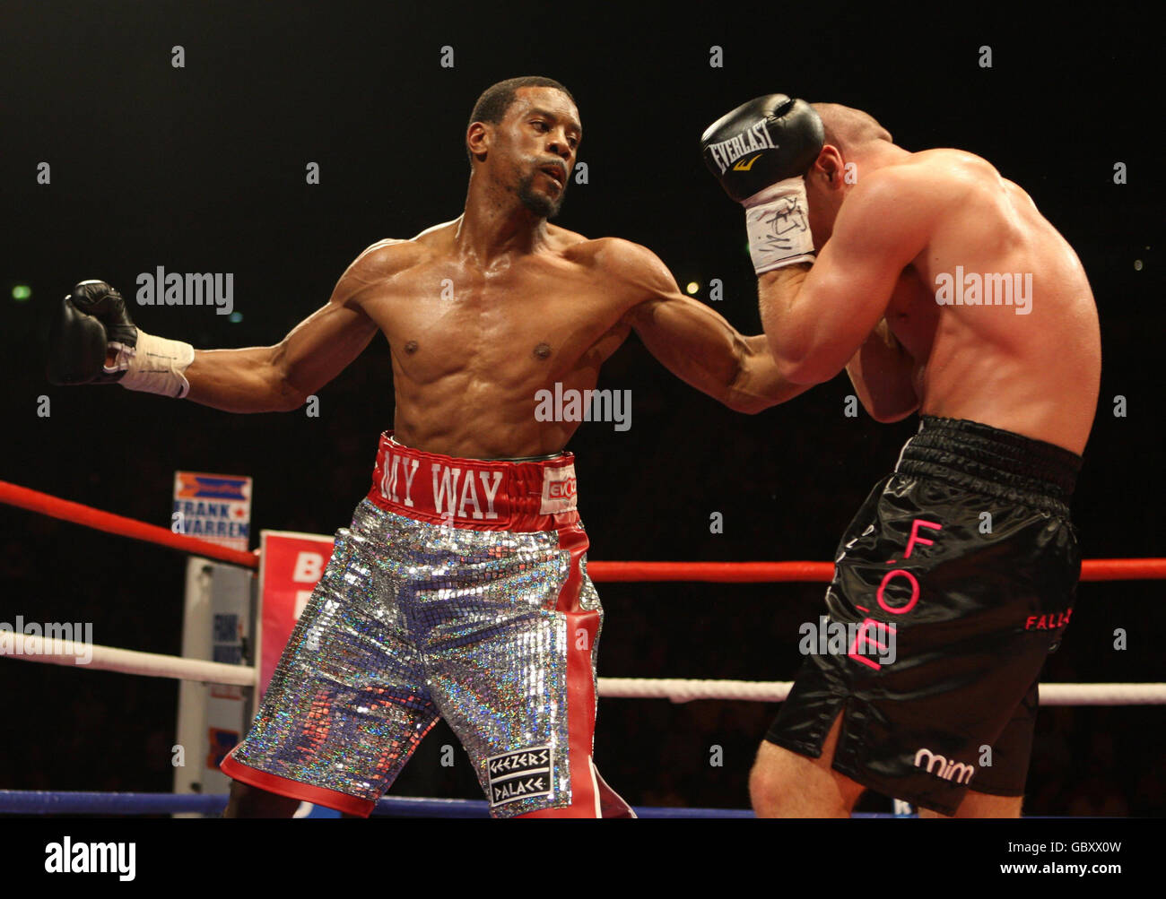 Anthony Small (left) on top with a left hand on his way to the stoppage ...