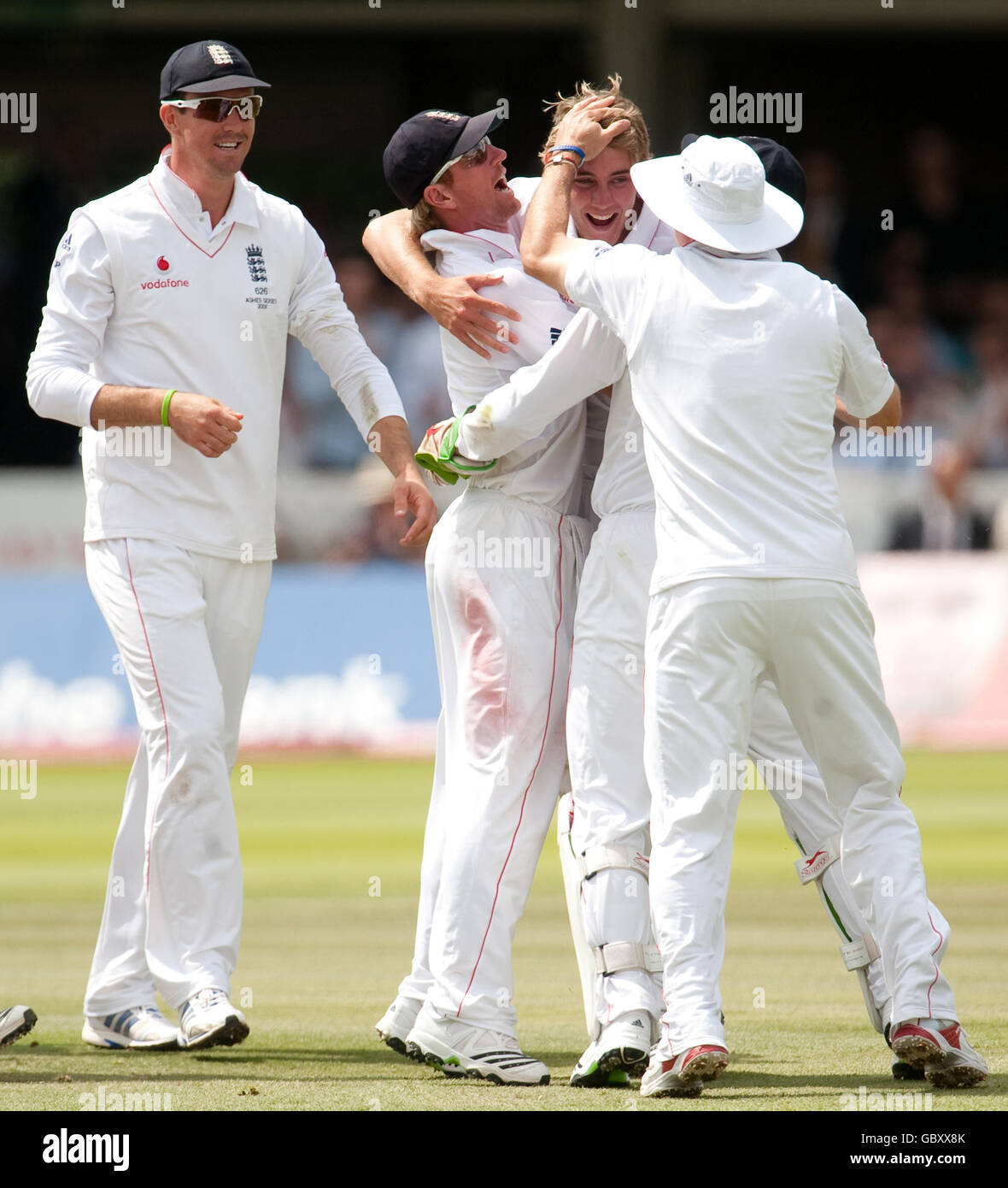 England's Stuart Broad (third right) celebrates bowling Australia ...