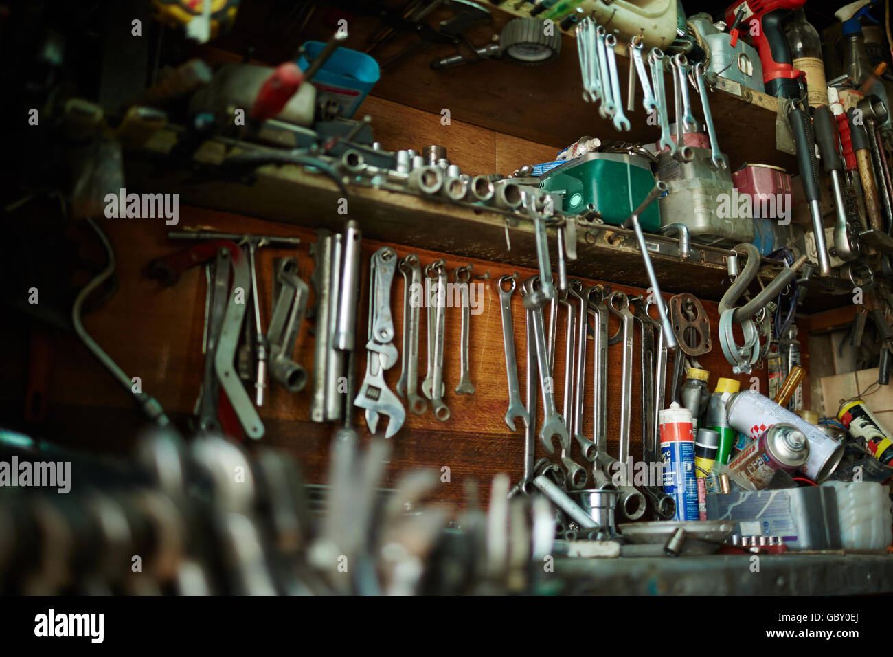 Old tools hanging on wall hi-res stock photography and images - Alamy