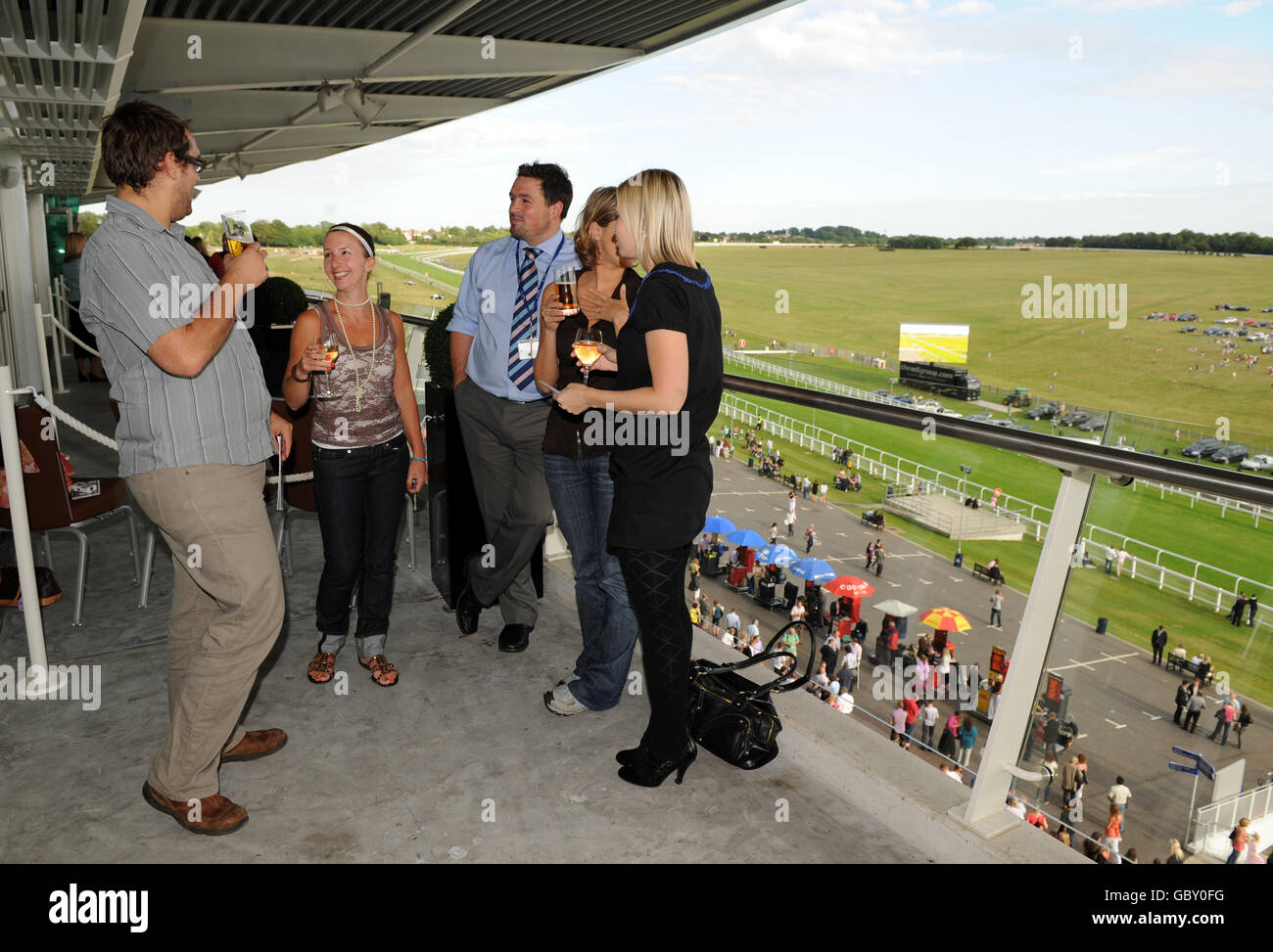 Horse Racing - Epsom Live! - Epsom Downs Racecourse. Racegoers enjoy ...