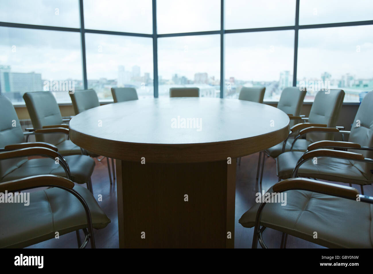 Conference table with chairs in an office Stock Photo - Alamy