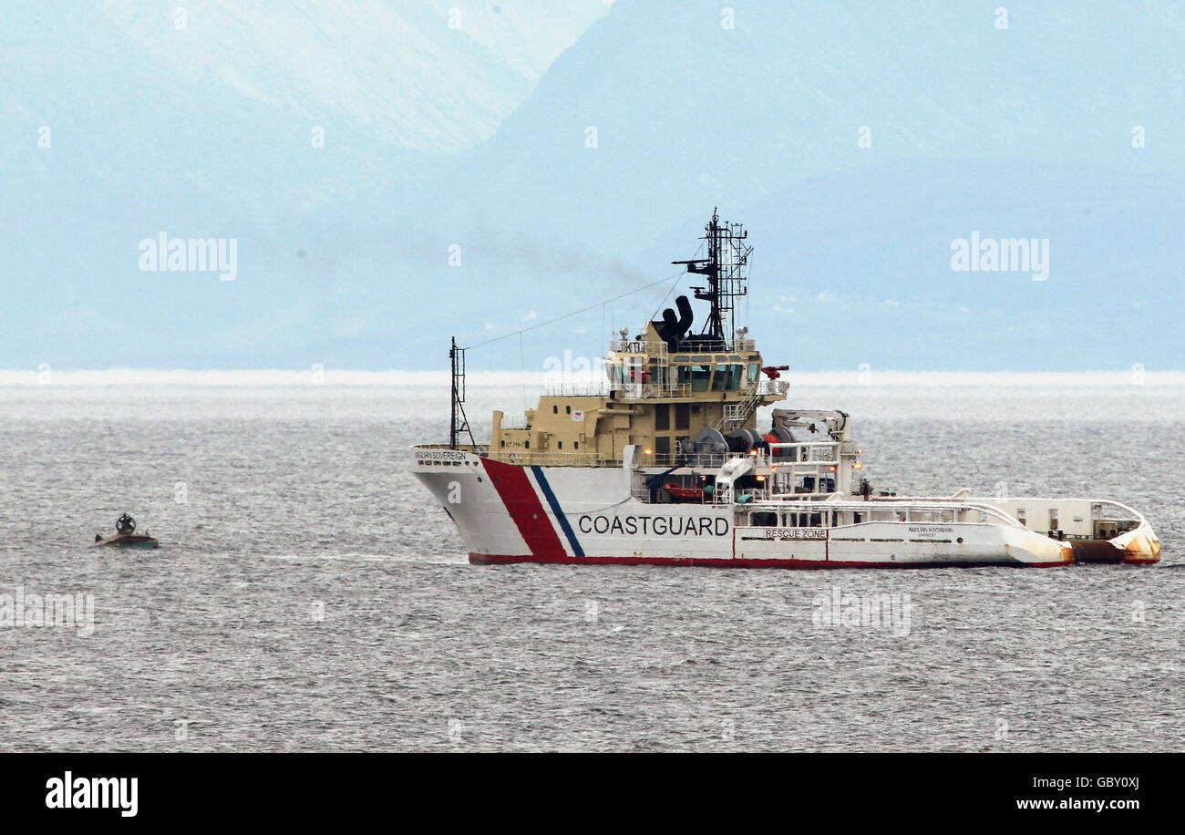 Capsized fishing boat Stock Photo - Alamy